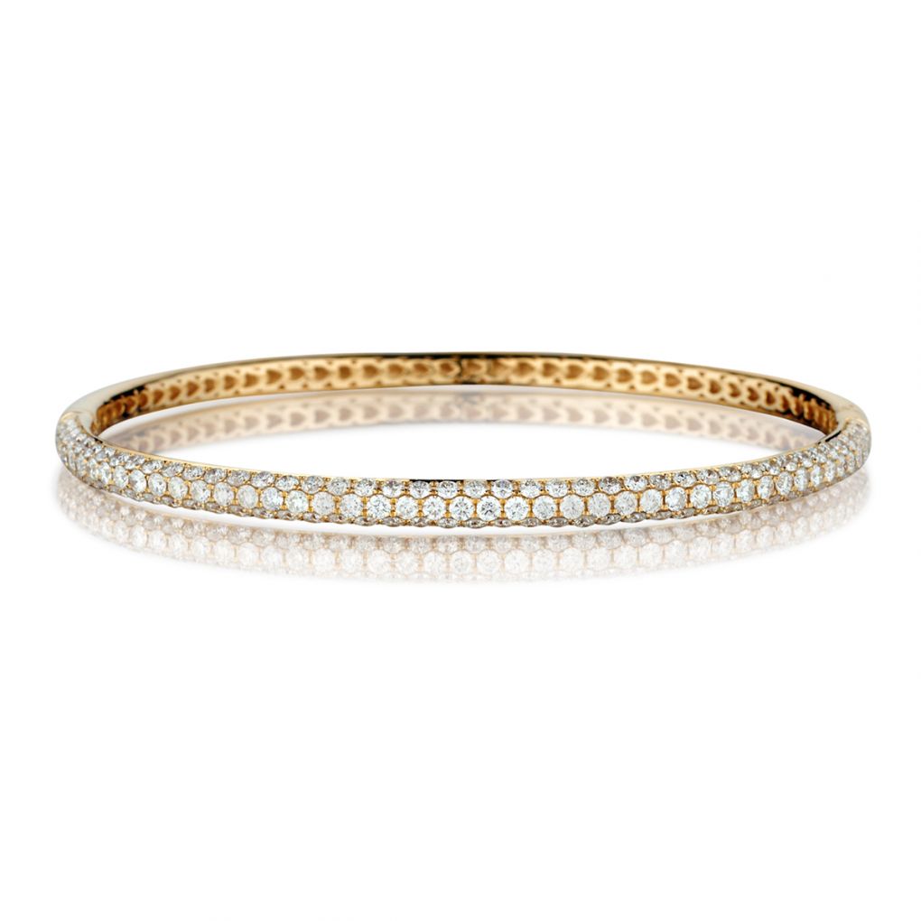 Diamond pave set bangle in 18kt y/g. 3.60ctw – Van Rijk